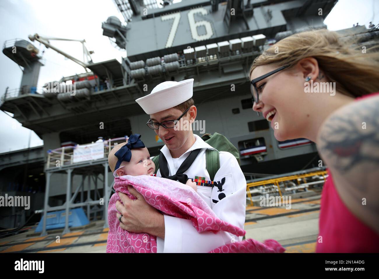 A crew member of U.S. navy nuclear-powered aircraft carrier USS Ronald ...