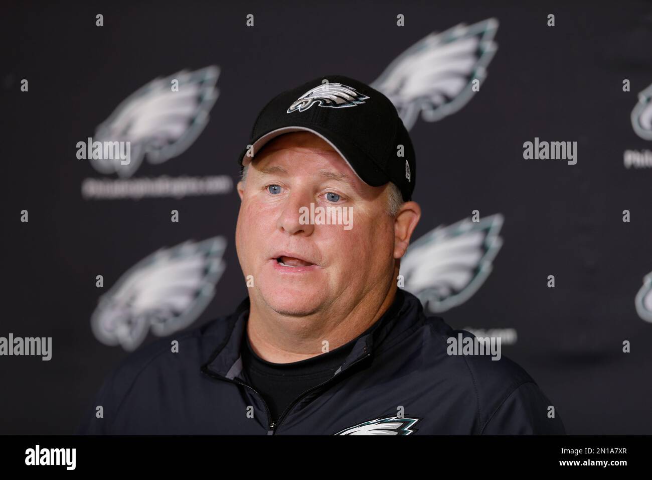 Philadelphia Eagles head coach Chip Kelly speaks with members of the ...