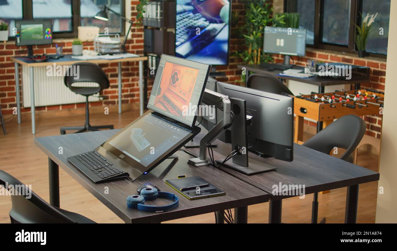 Creative agency office with monitors to work on development and ...