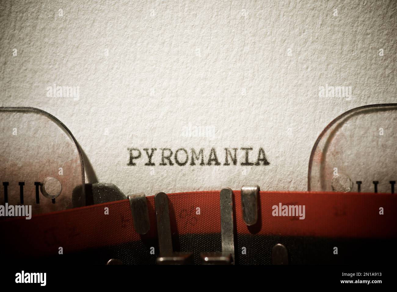 Pyromania word written with a typewriter Stock Photo - Alamy