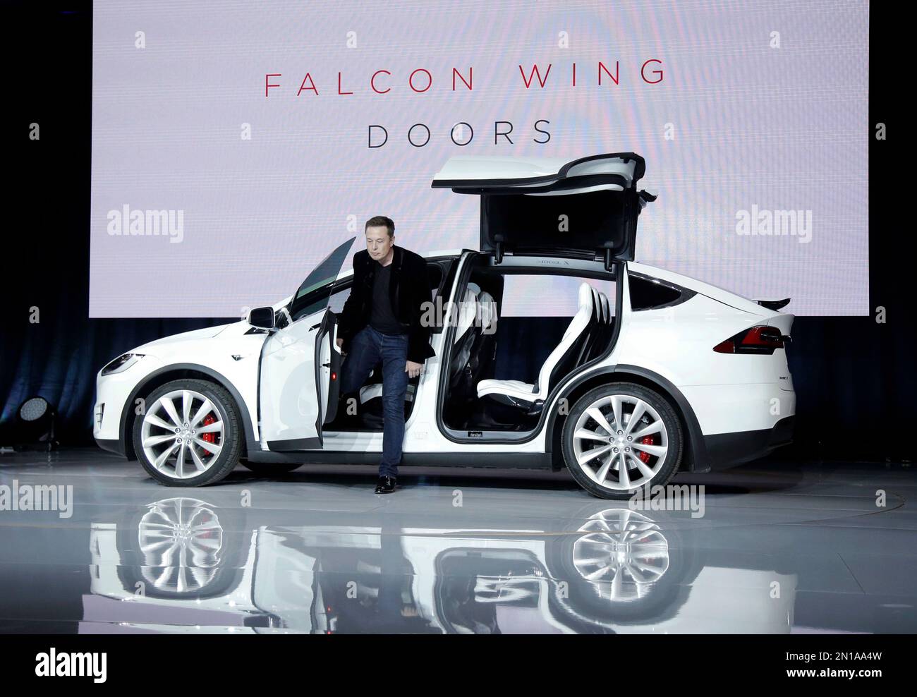 Elon Musk, CEO of Tesla Motors Inc., introduces the Model X car at the ...