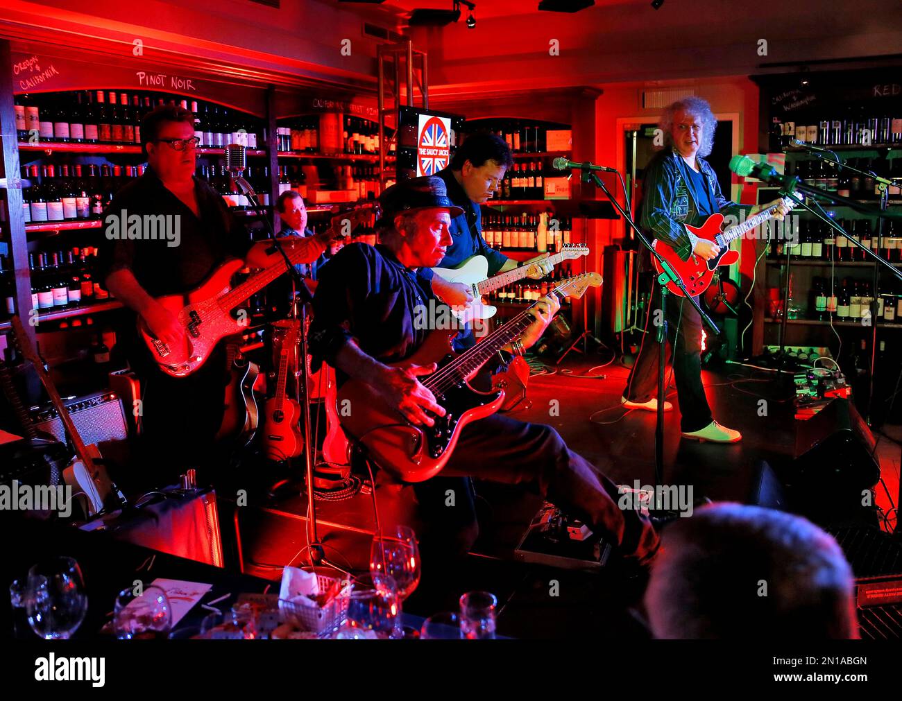 Musician Nils Lofgren, front, of Bruce Springsteen's E-Street Band ...