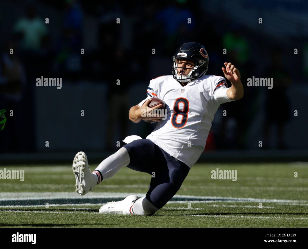 Chicago Bears quarterback Jimmy Clausen, slides for protection during ...