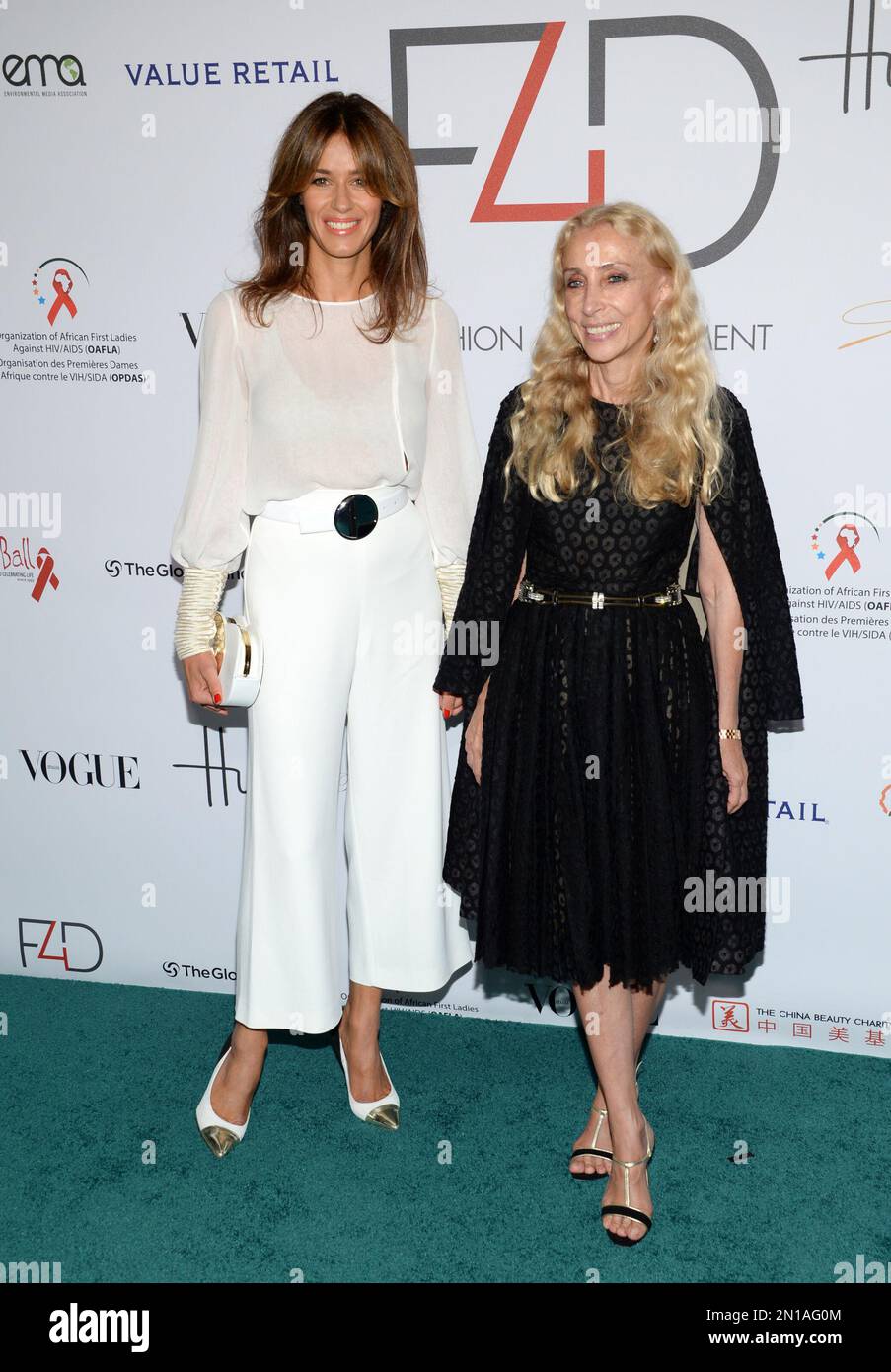 Fashion designer Sara Cavazza Facchini, left, and Vogue Italia editor ...