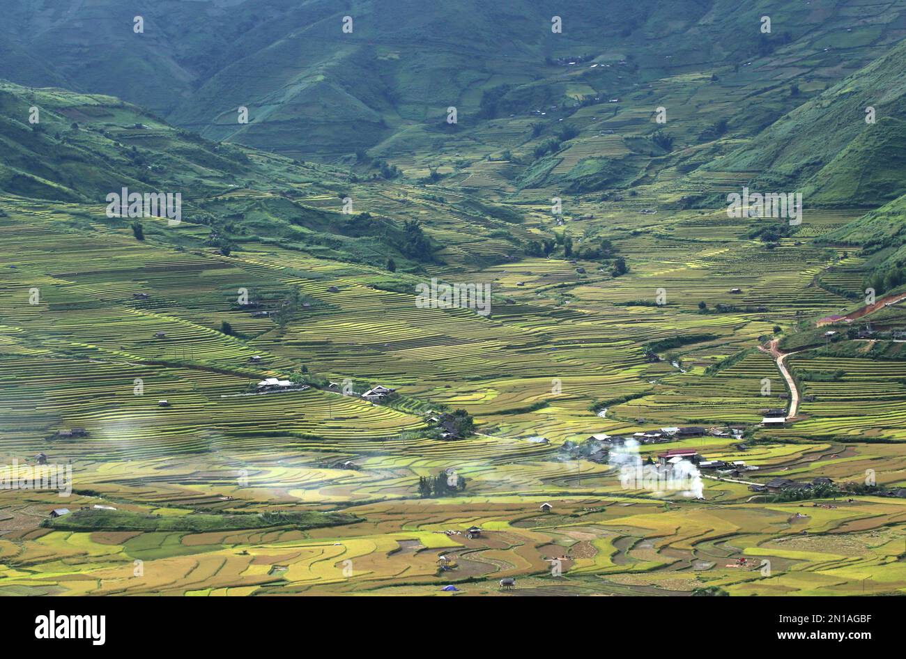 A Hmong village and rice fields are seen from a mountain pass in Mu ...