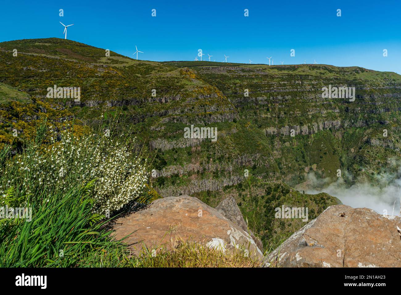 Paul da Serra mountain plateau with wind turbines from Levada do Paul ...