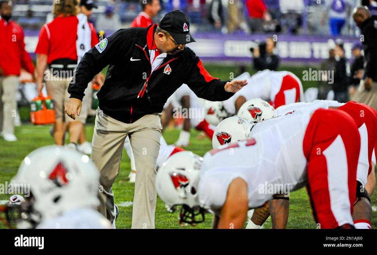 Ball State head coach Pete Lembo talks with players before an NCAA ...