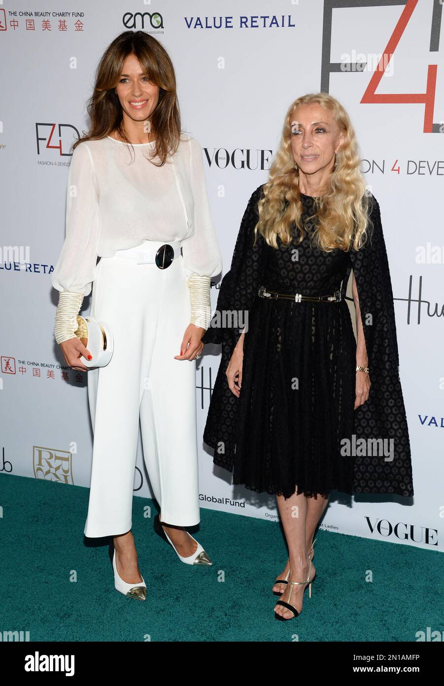 Fashion designer Sara Cavazza Facchini, left, and Vogue Italia editor ...