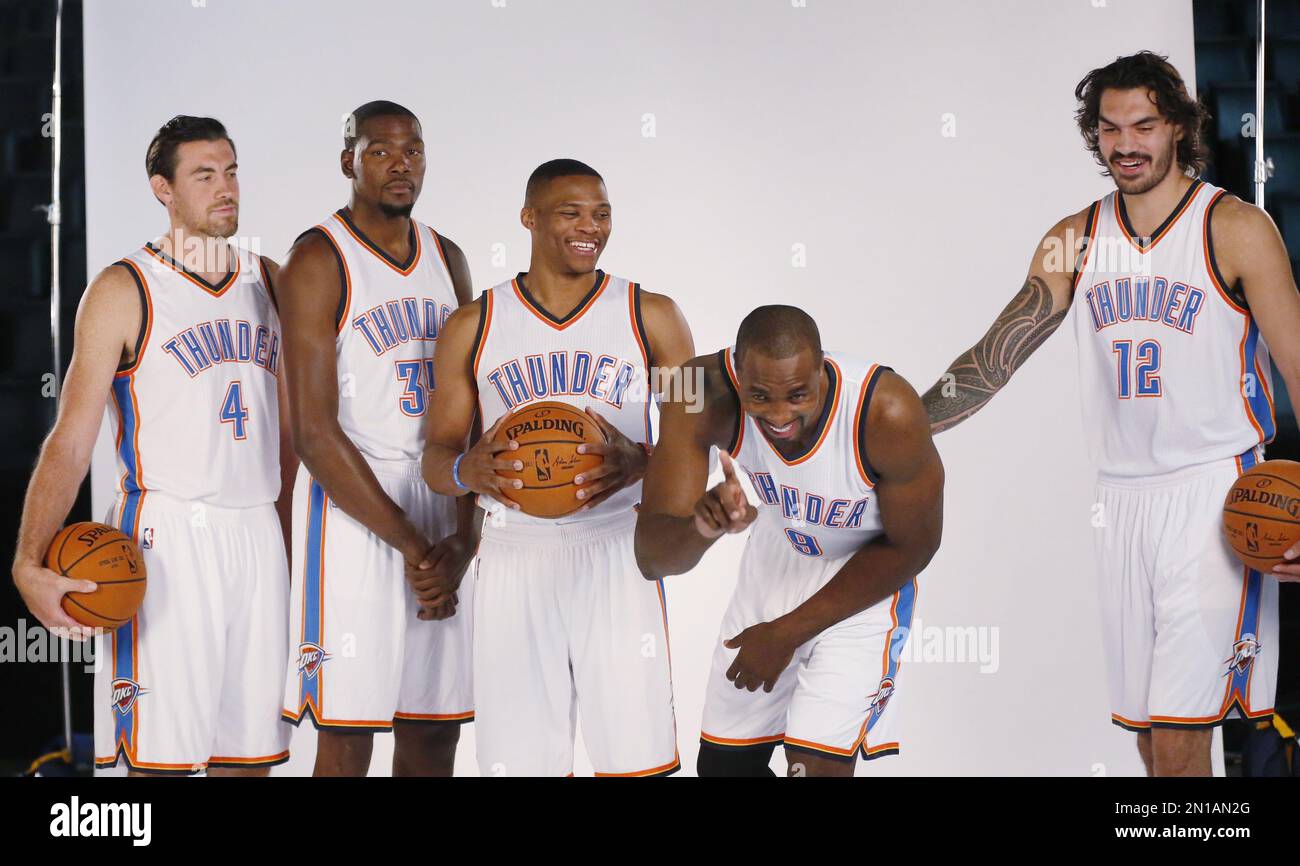 Oklahoma City Thunder forward Serge Ibaka, second from right, laughs as ...