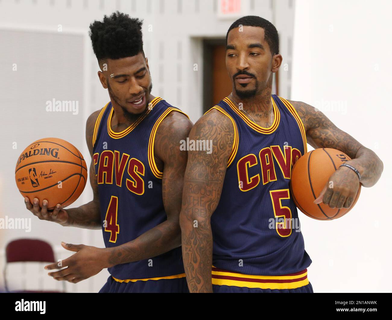 Cleveland Cavaliers' Iman Shumpert, left, and J.R. Smith try to figure ...