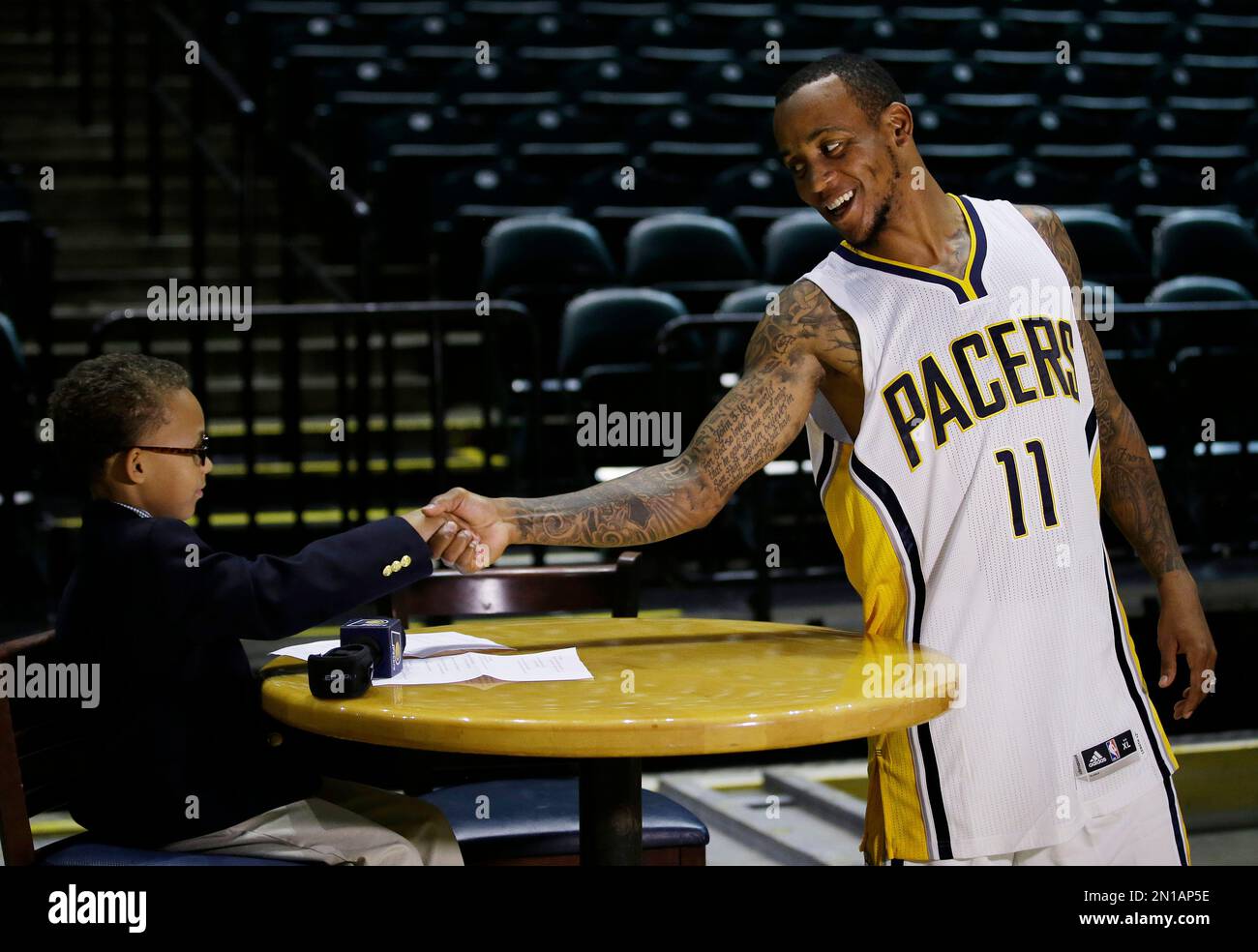 Indiana Pacers guard Monta Ellis shakes hands with Coleman Reynolds ...