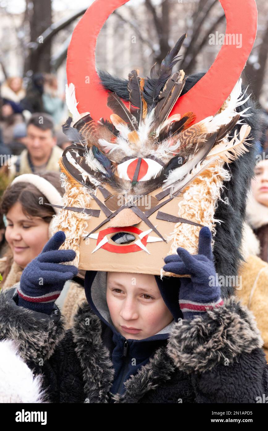 Young participant with mask off at the Surva International Masquerade ...