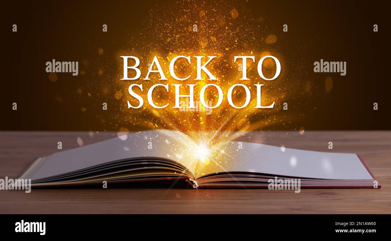 Educational inscription coming out from an open book Stock Photo - Alamy