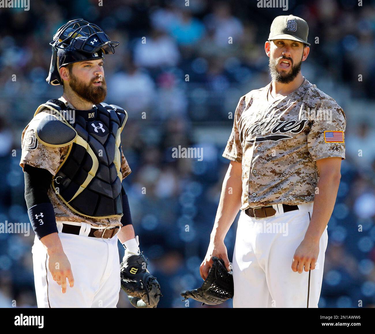 San Diego Padres catcher Derek Norris, left, and starting pitcher James ...