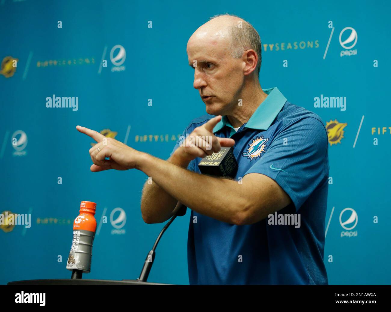 Miami Dolphins head coach Joe Philbin gestures during a post-game news ...