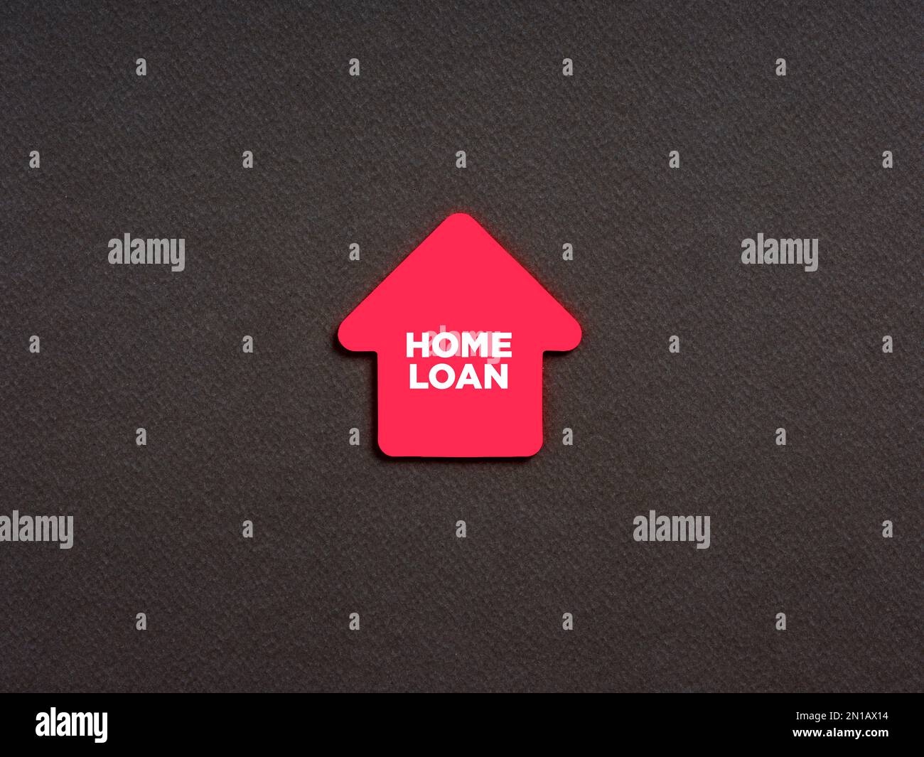The word home loan written on a house shaped note paper. Home loan ...
