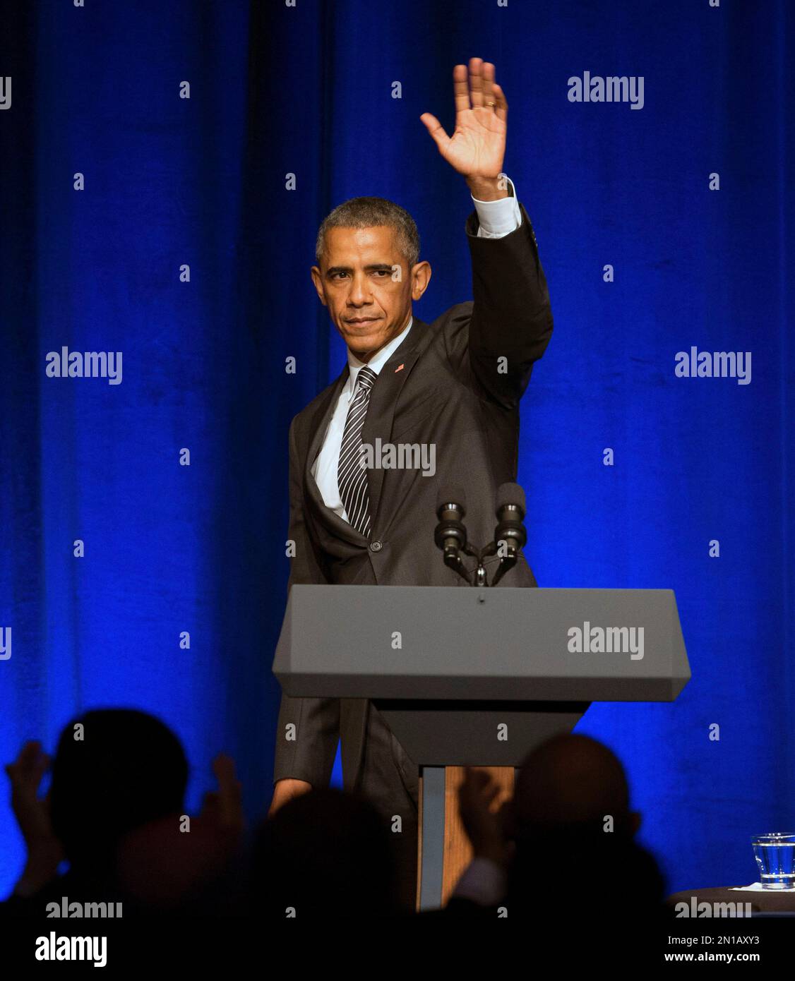 President Barack Obama waves to the crowd after speaking at a ...