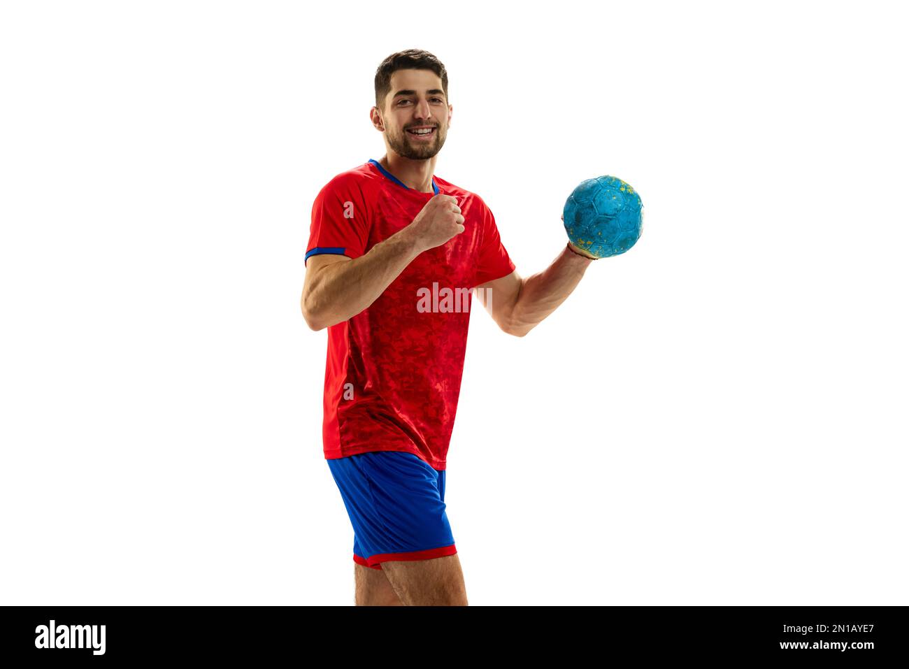 Winner. Portrait of young man, professional handball playing in uniform ...