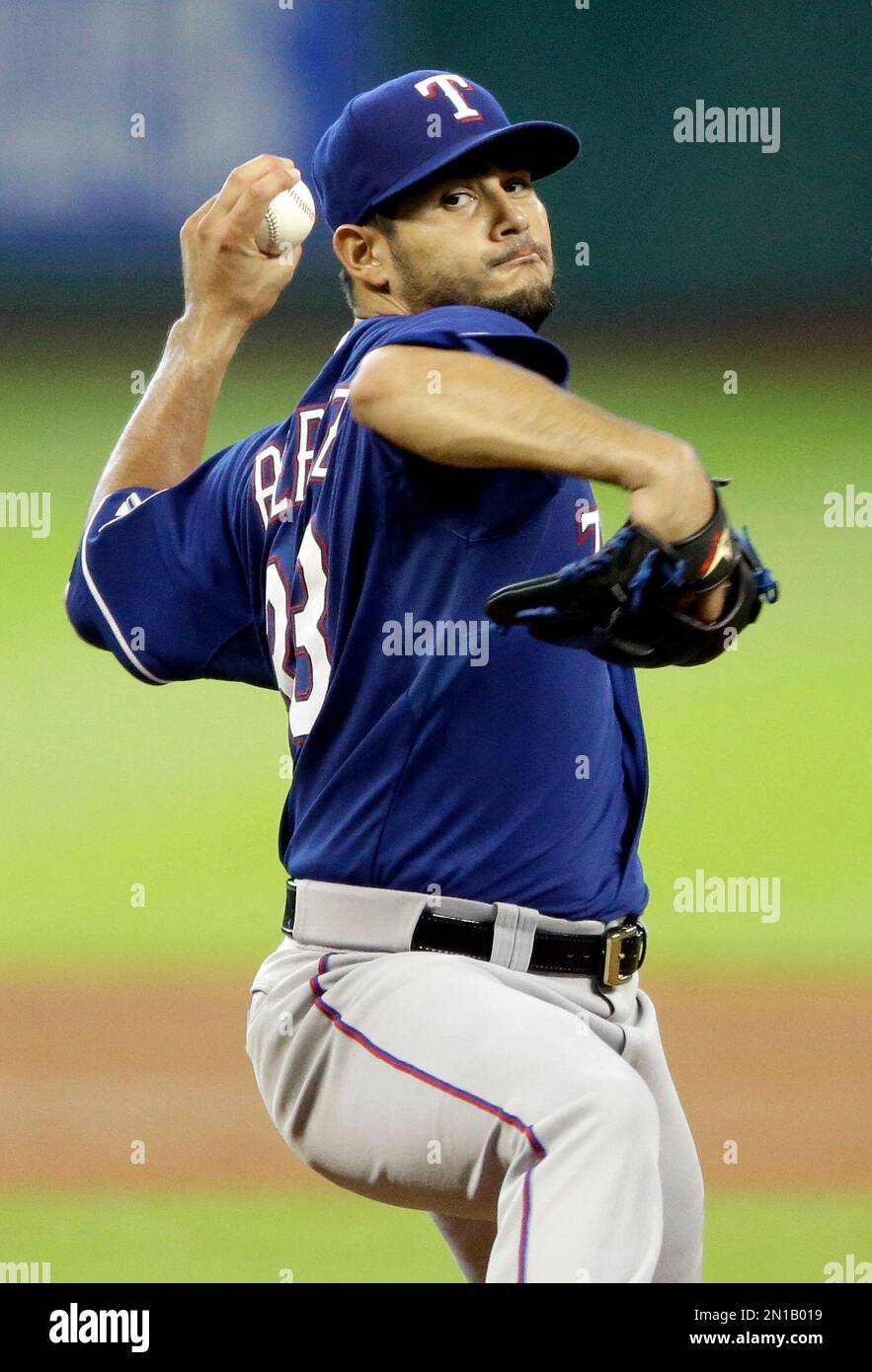 Texas Rangers' Martin Perez delivers a pitch against the Houston Astros ...