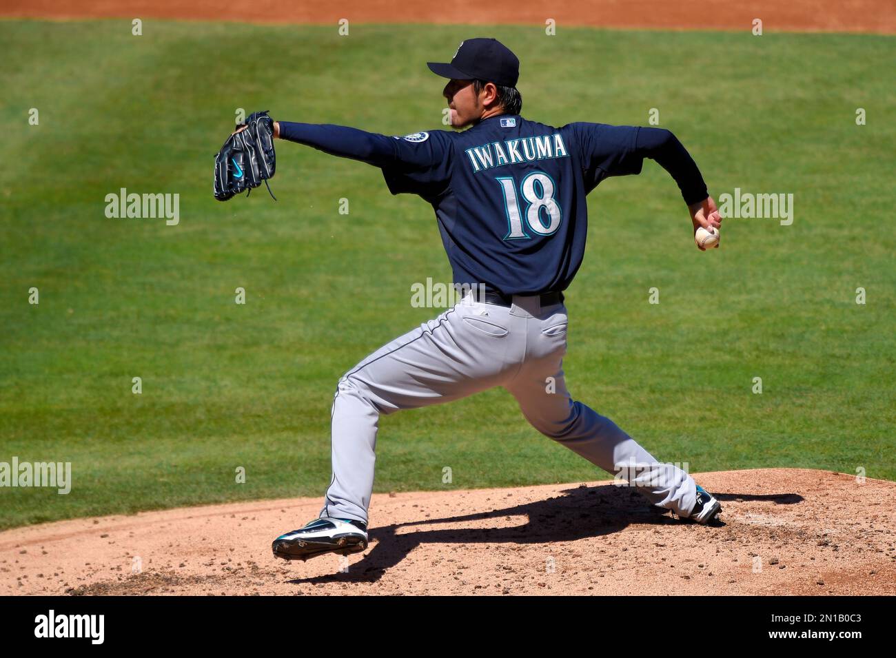 Seattle Mariners starting pitcher Hisashi Iwakuma, of Japan, throws to ...