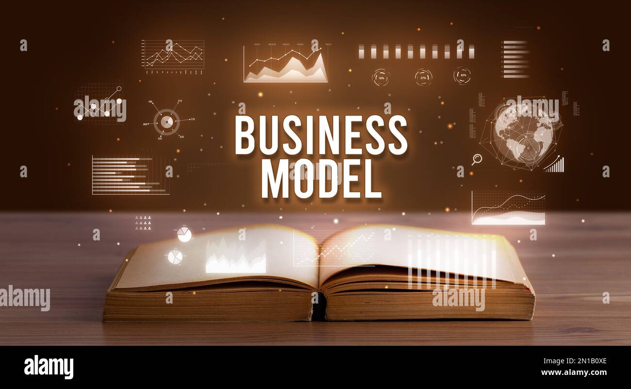 Business inscription coming out from an open book Stock Photo - Alamy
