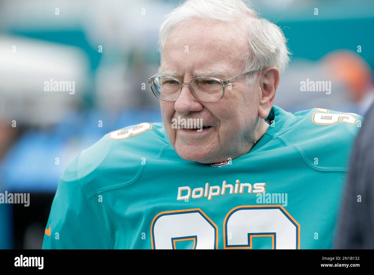 American business magnate Warren Buffett looks from the sidelines ...