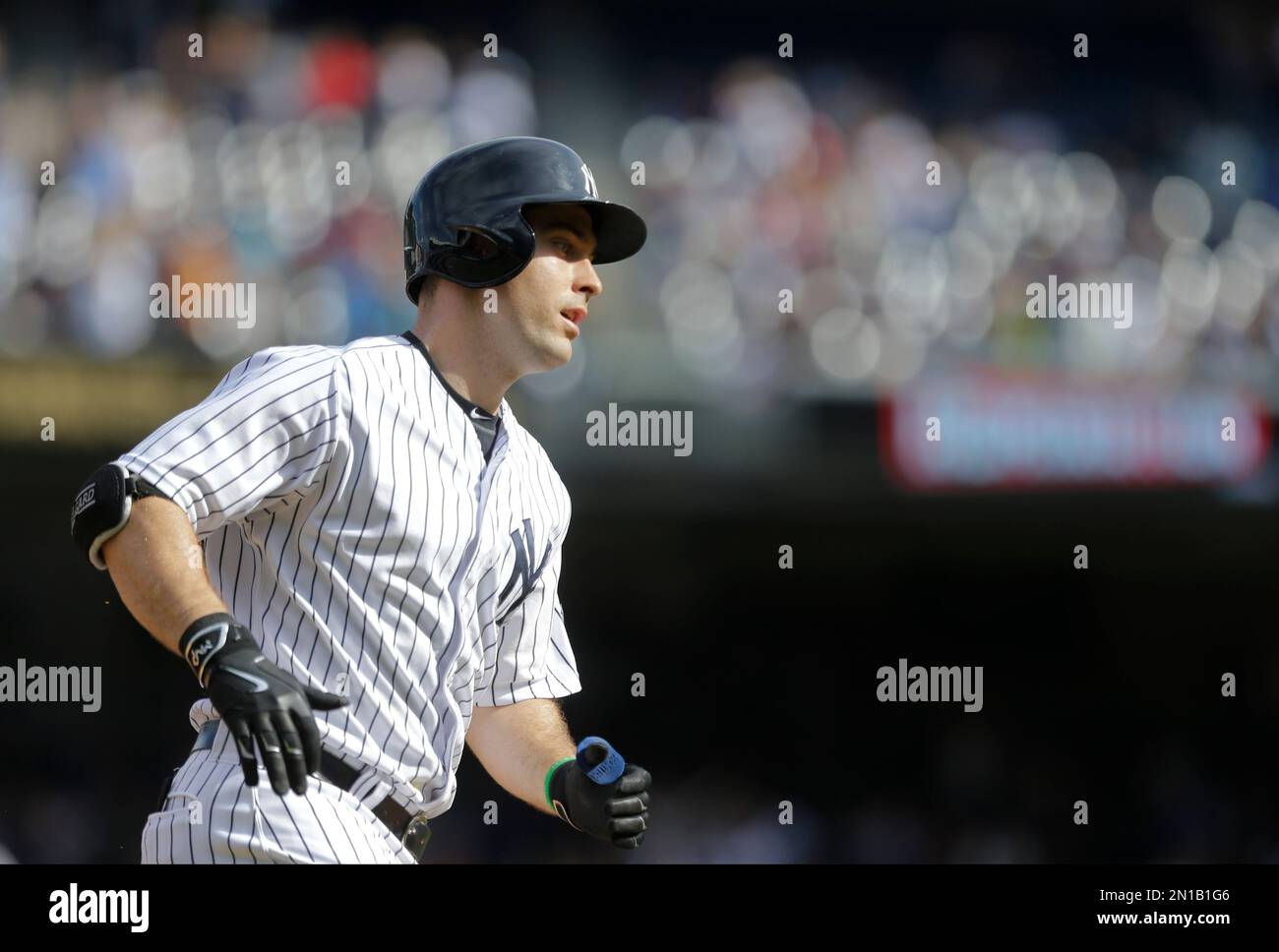 New York Yankees' Dustin Ackley heads to home plate after hitting a ...