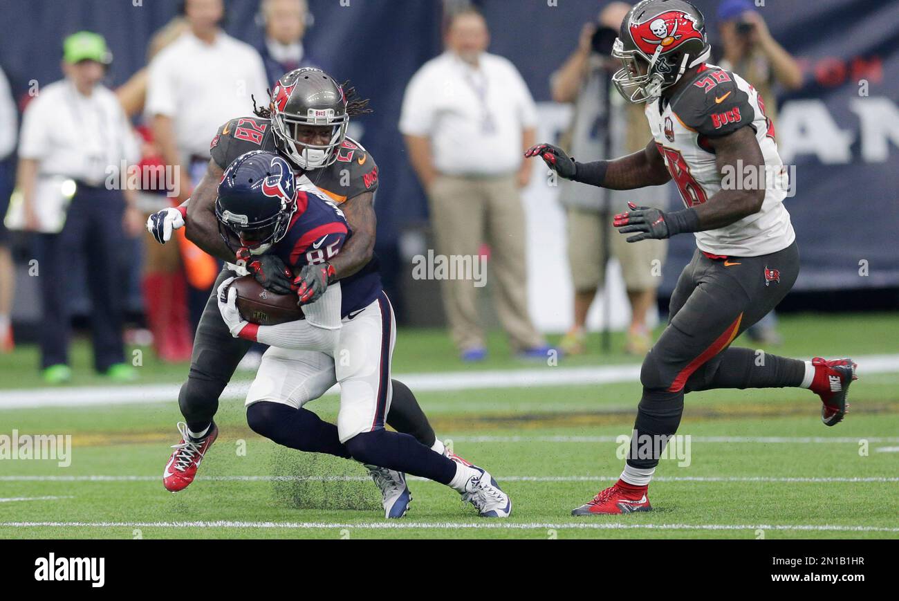 Houston Texans' Nate Washington (85) is stopped by Tampa Bay Buccaneers ...