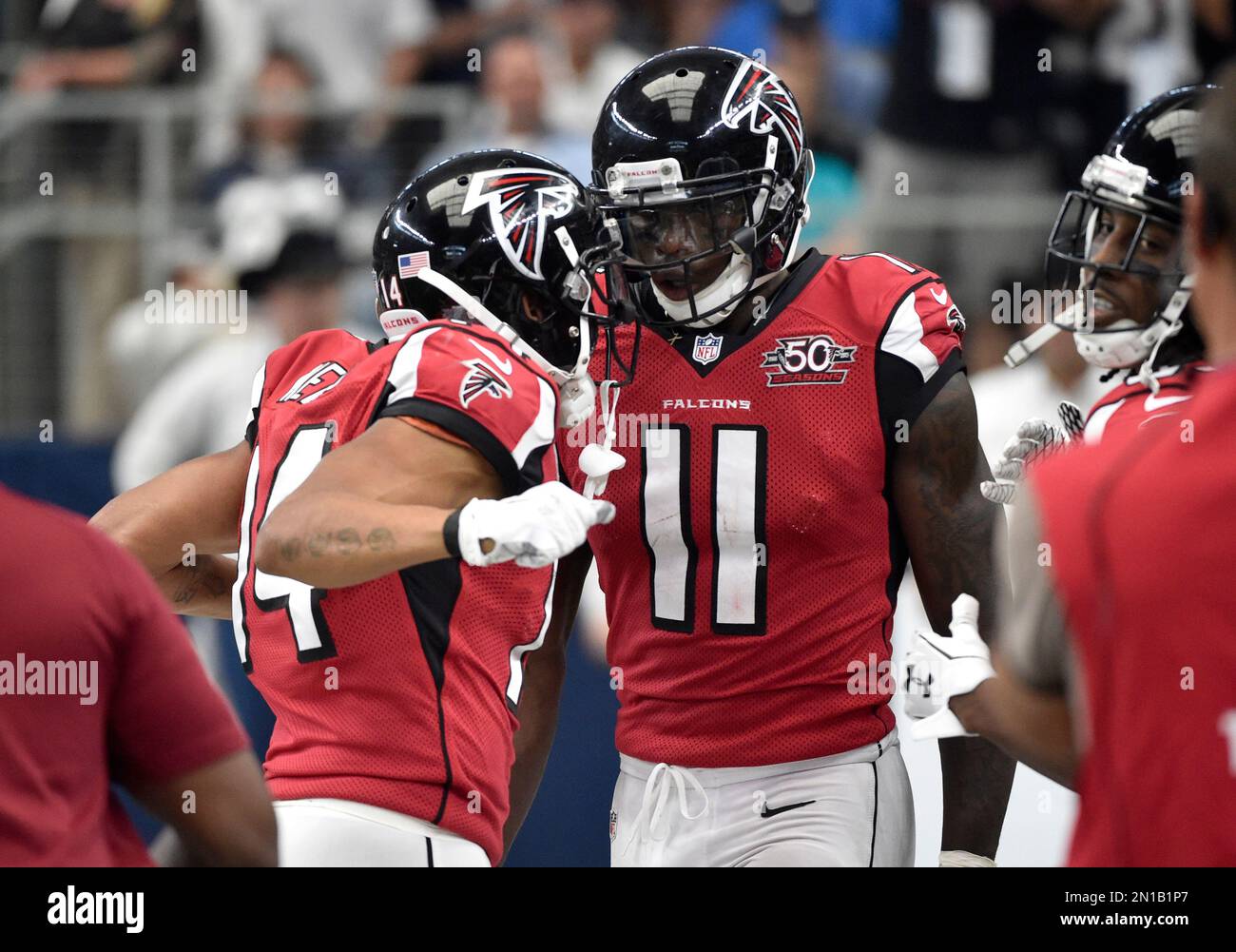 Atlanta Falcons' Eric Weems (14) and Julio Jones (11) celebrate a ...