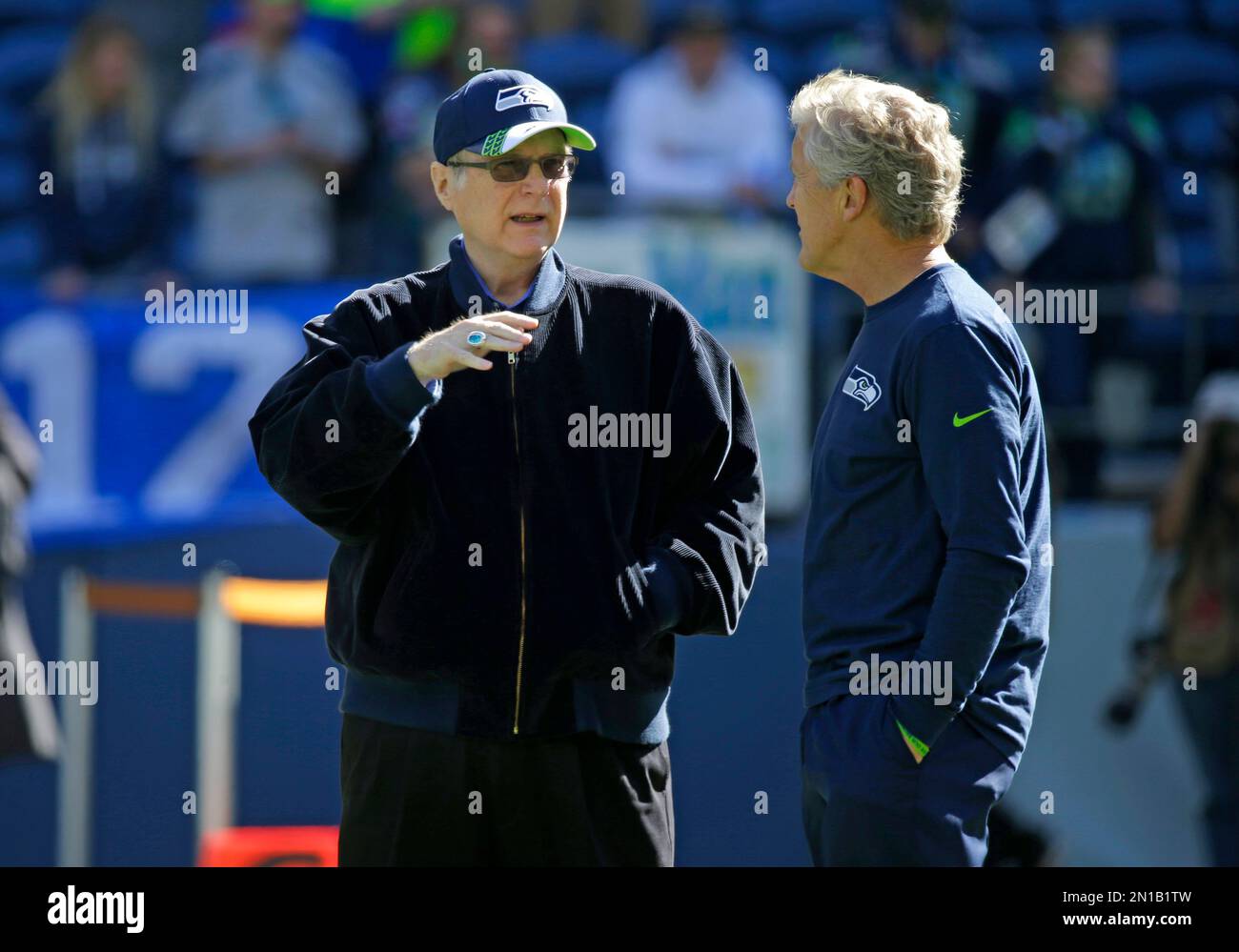 Seattle Seahawks owner Paul Allen, left, talks with Seahawks head coach ...