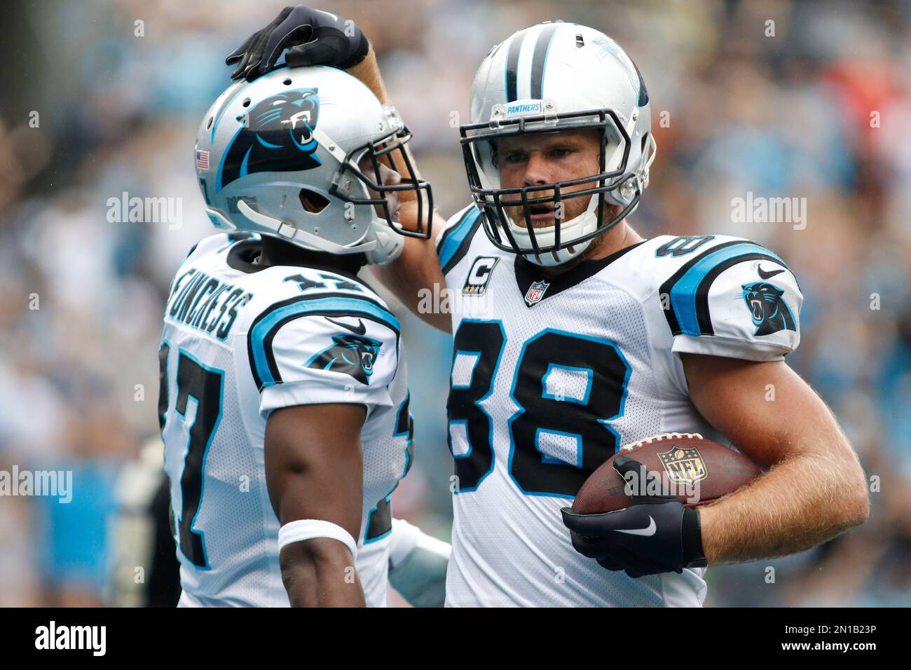 Carolina Panthers' Greg Olsen (88) celebrates his touchdown against the ...