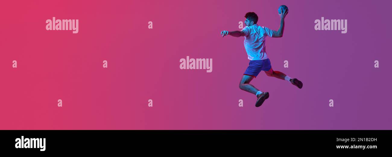 Throwing ball. Young man, professional handball player training ...