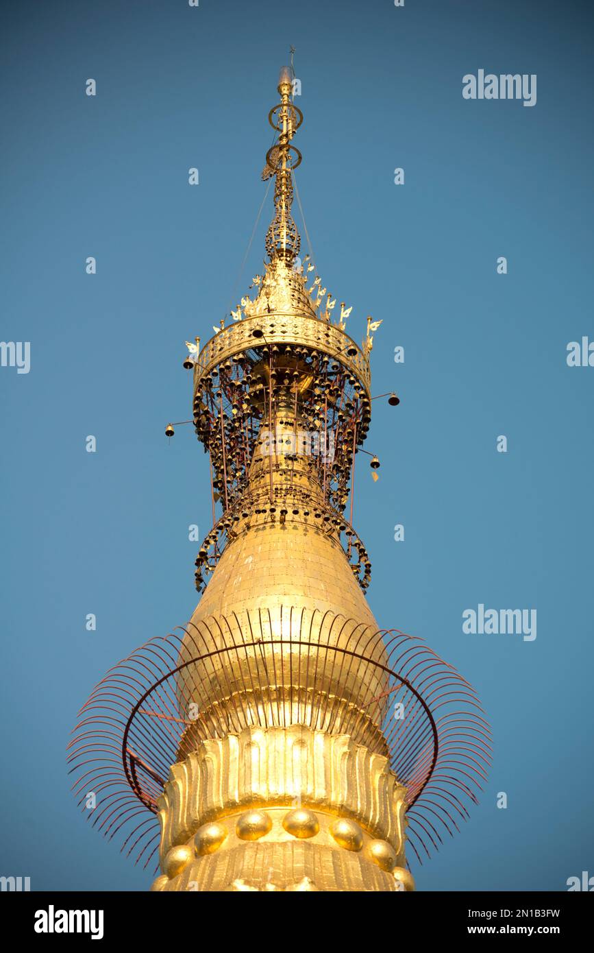 Golden spire against blue sky, Botahtaung Paya (Buddha's First Sacred ...