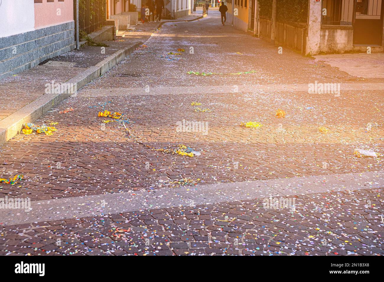 Colorful confetti and streamers at the street after Carnival show Stock ...