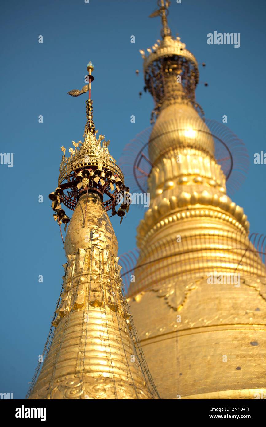 Golden spires against blue sky, Botahtaung Paya (Buddha's First Sacred ...