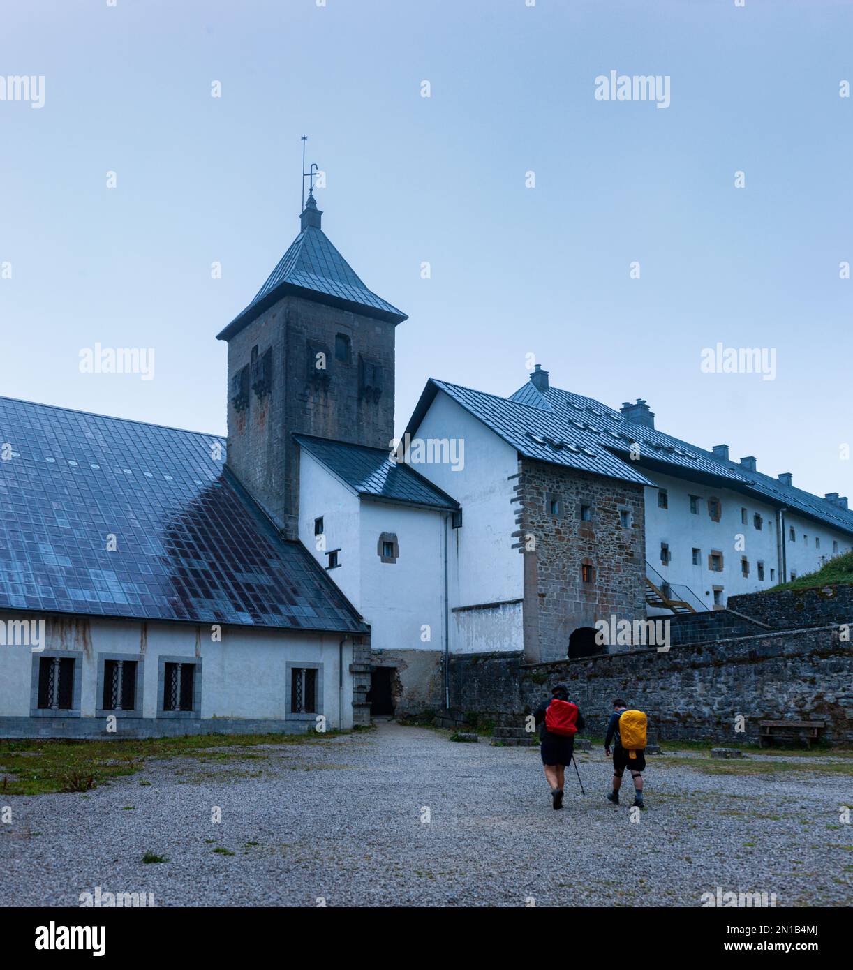 View at early morning of two pilgrims start the Way of St. James from ...