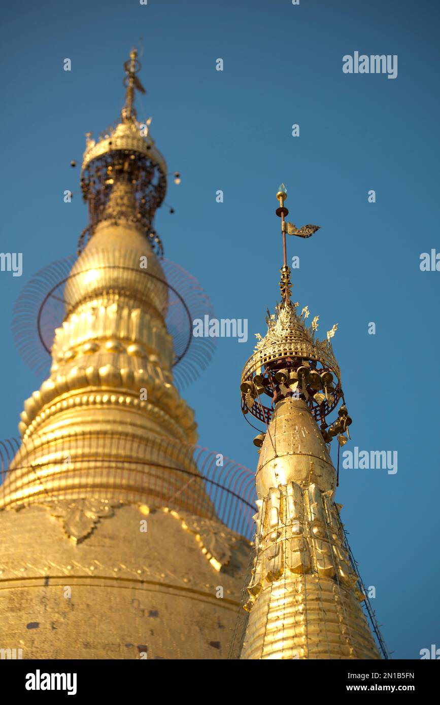 Golden spires against blue sky, Botahtaung Paya (Buddha's First Sacred ...