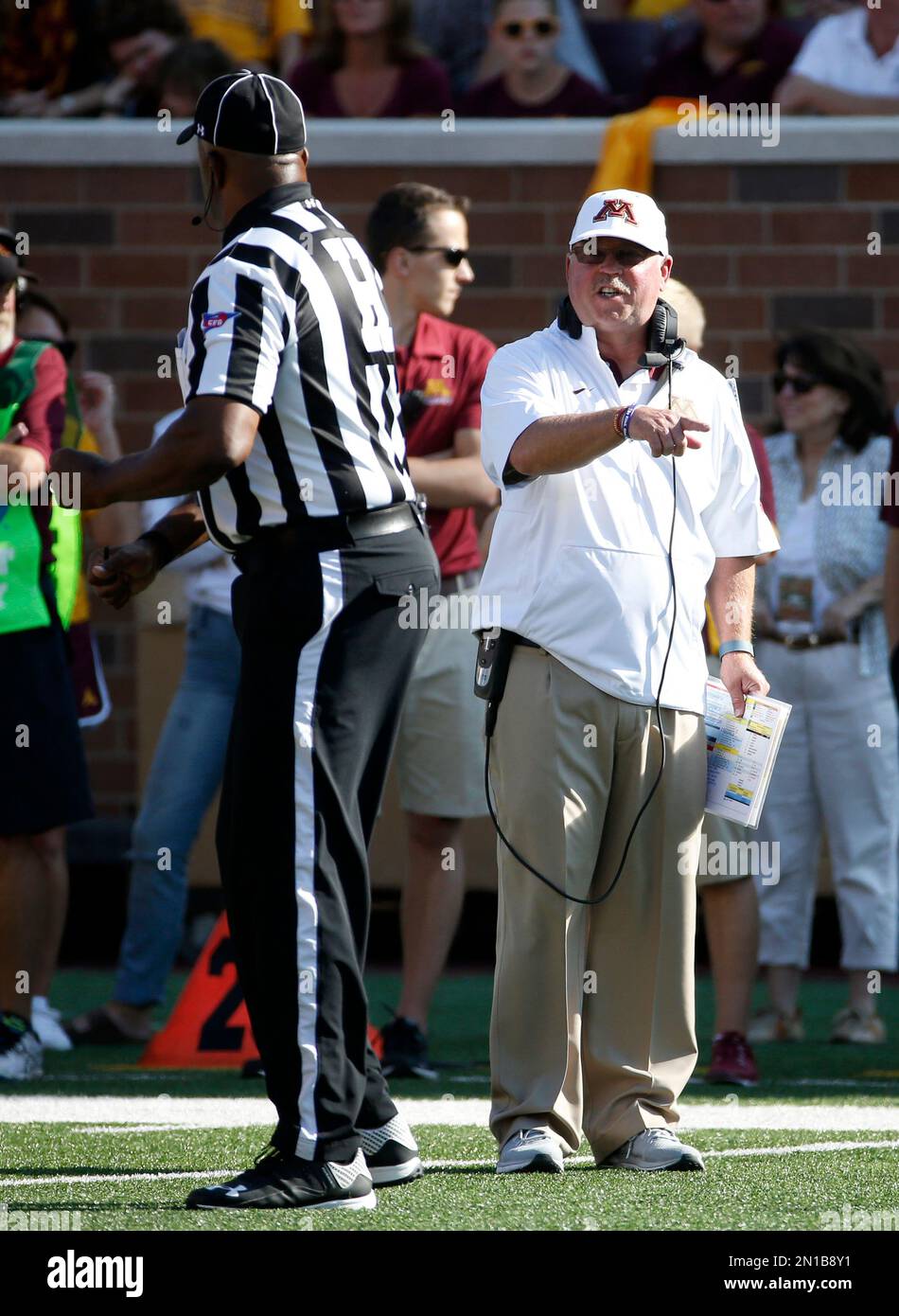 Minnesota head coach Jerry Kill questions a call during the first half ...