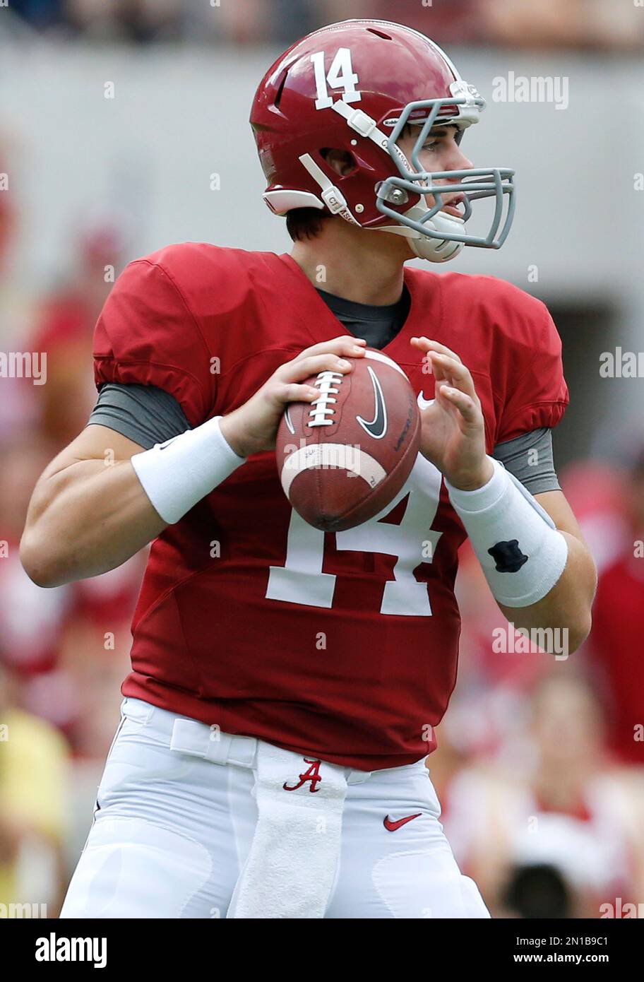 Alabama quarterback Jake Coker (14) looks to pass during the first half ...