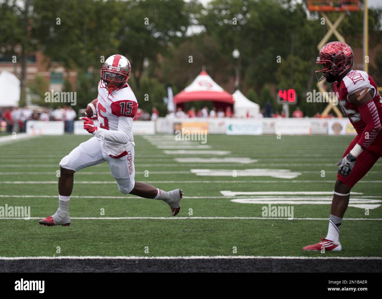 Western Kentucky wide receiver Nicholas Norris (15), left, runs in a ...