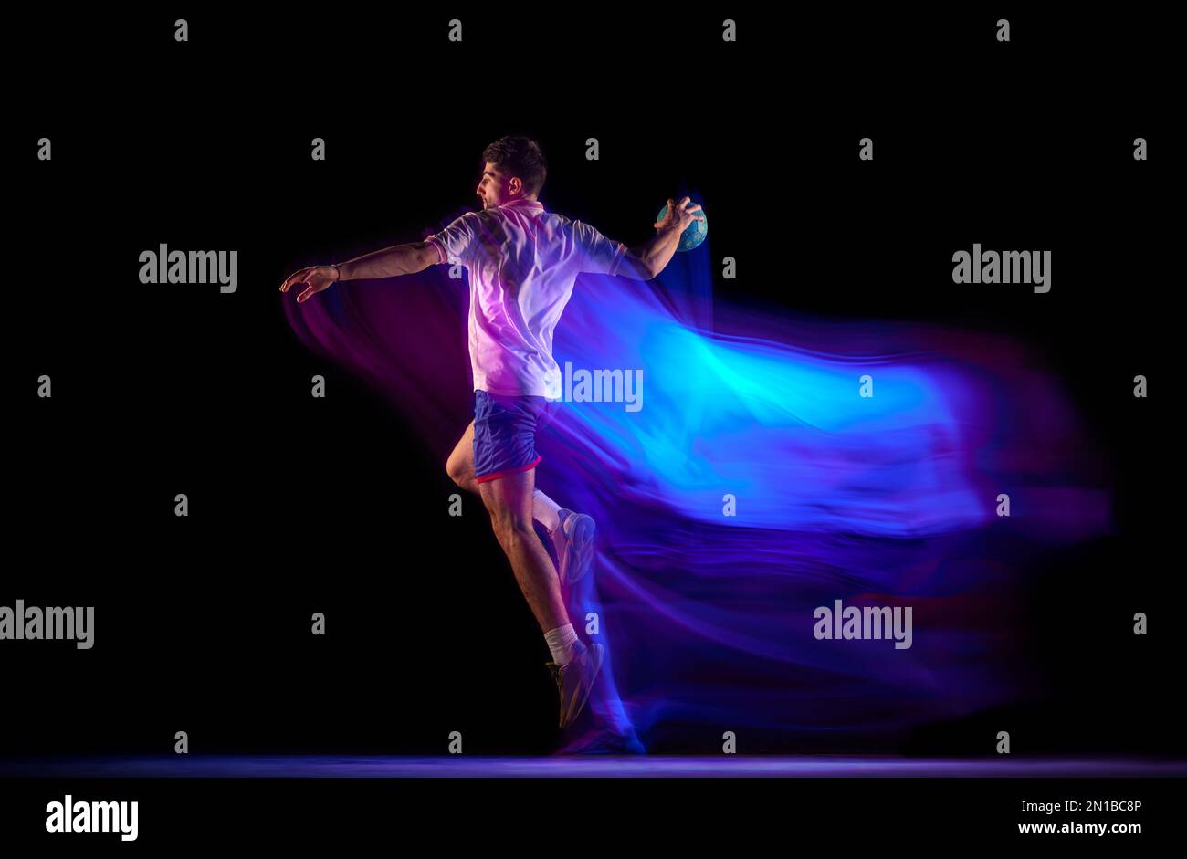 Side view. Winning goal. Young man, professional handball player in ...