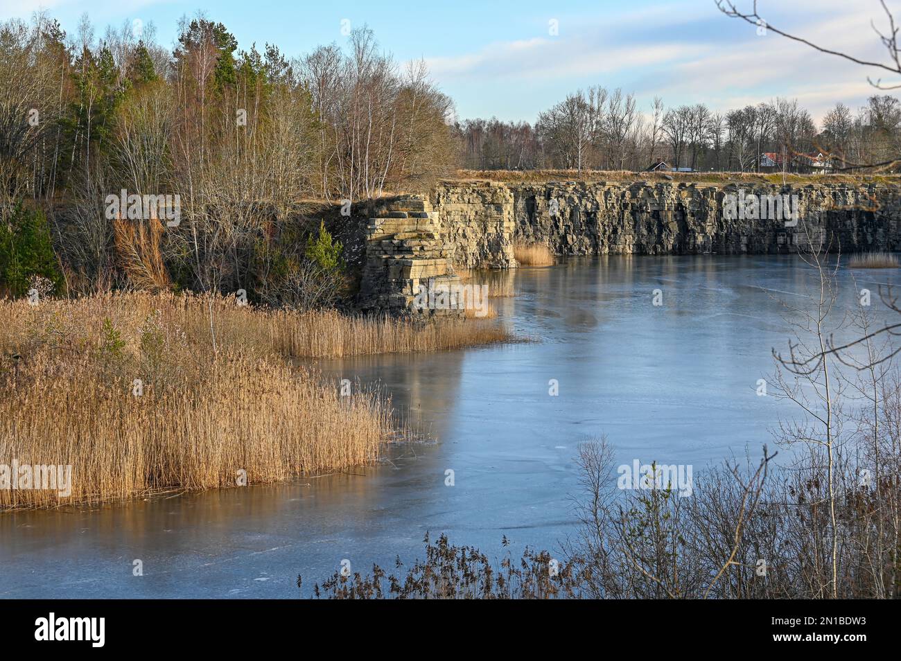 limestone quarry filled with water and reed Stock Photo - Alamy