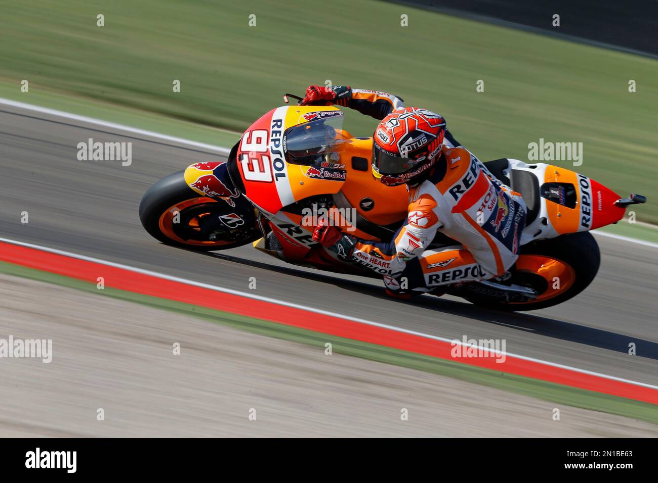 MotoGP rider Marc Marquez of Spain leans into a curve with his Honda ...
