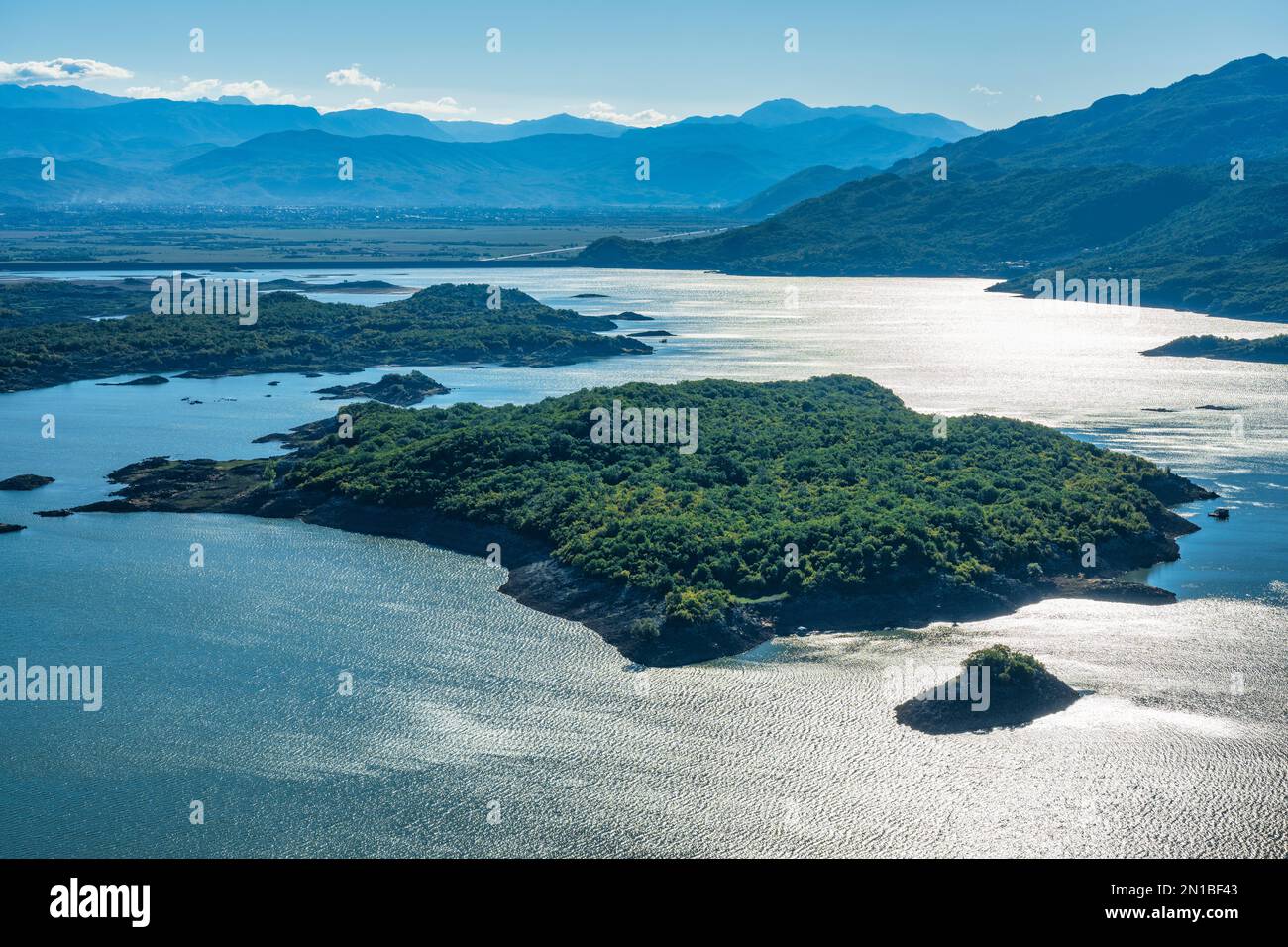 The sparkling turquoise water of Slansko Lake (Slano Jezero) near ...