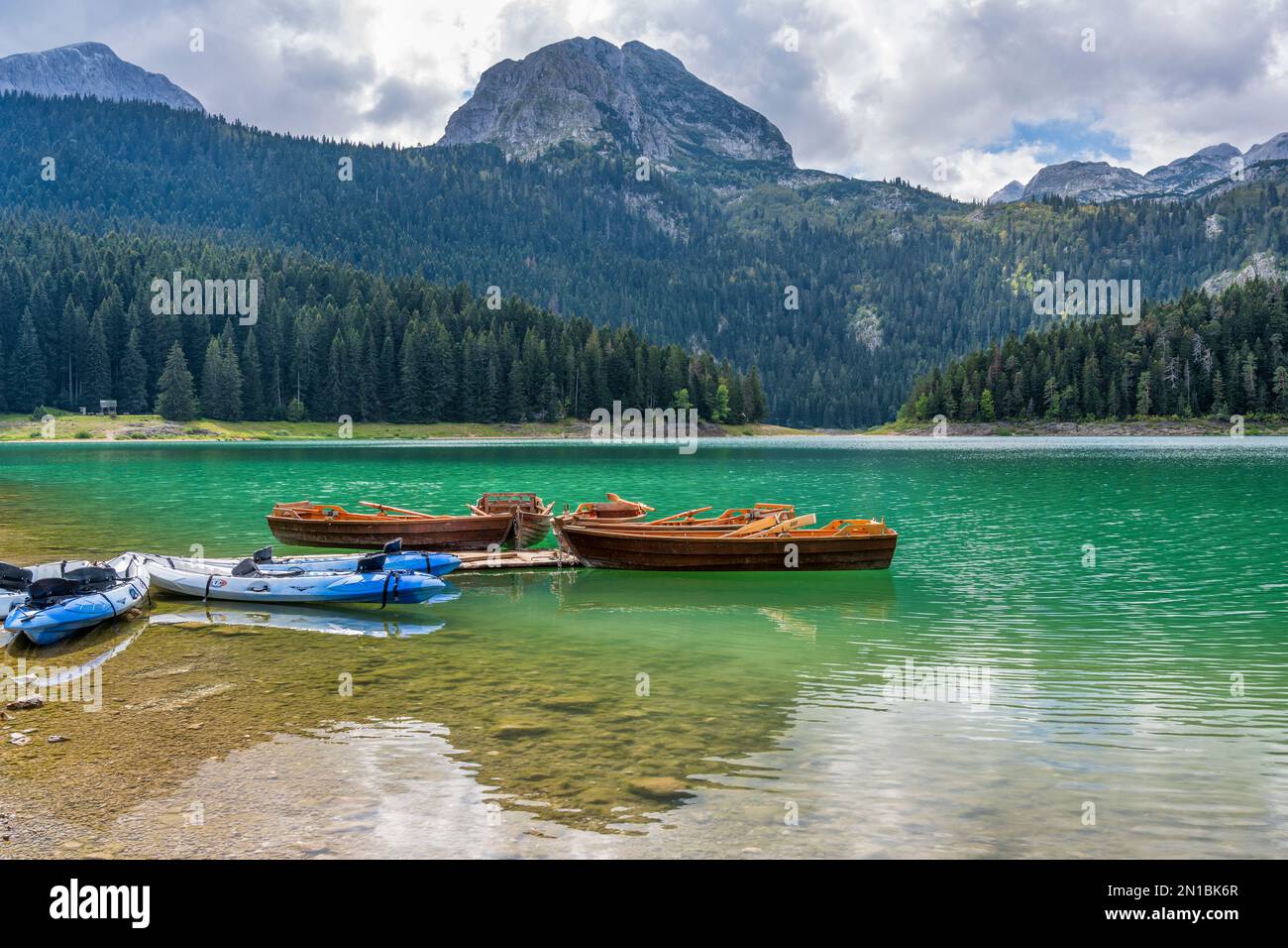 Rowing boats and canoes on the Black Lake (Crno Jezero), with Meded ...