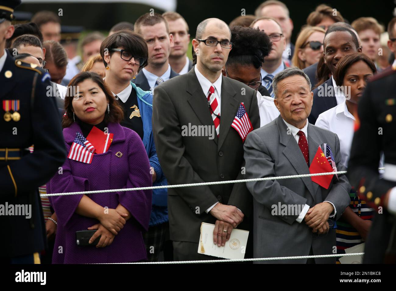 Guest listen as Chinese President Xi Jinping speaks during an official ...