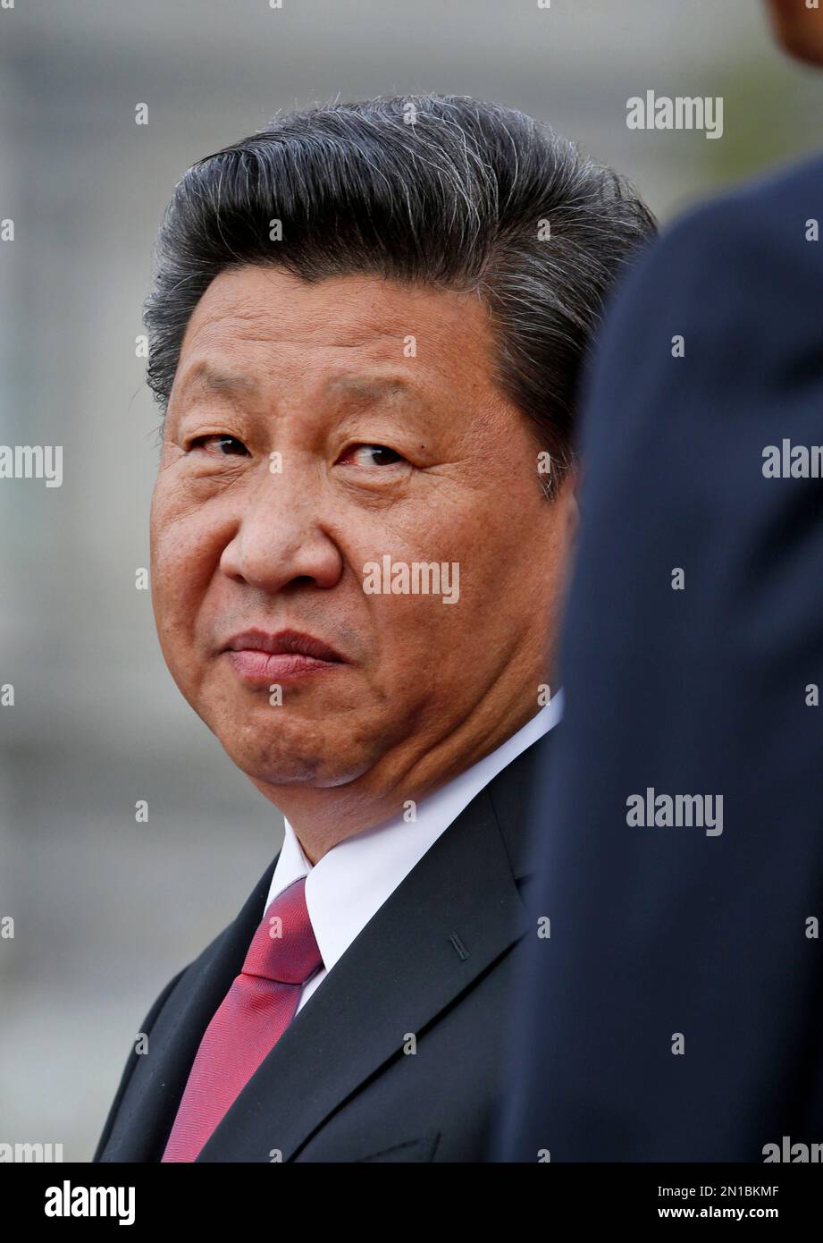 Chinese President Xi Jinping looks to President Barack Obama and during ...