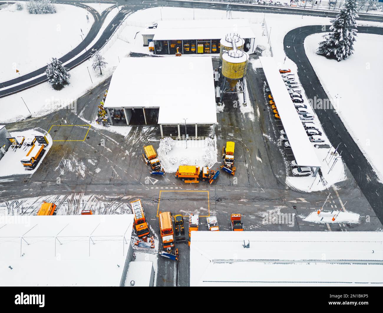 Highway maintenance base on a winter day busy with snow causing ...
