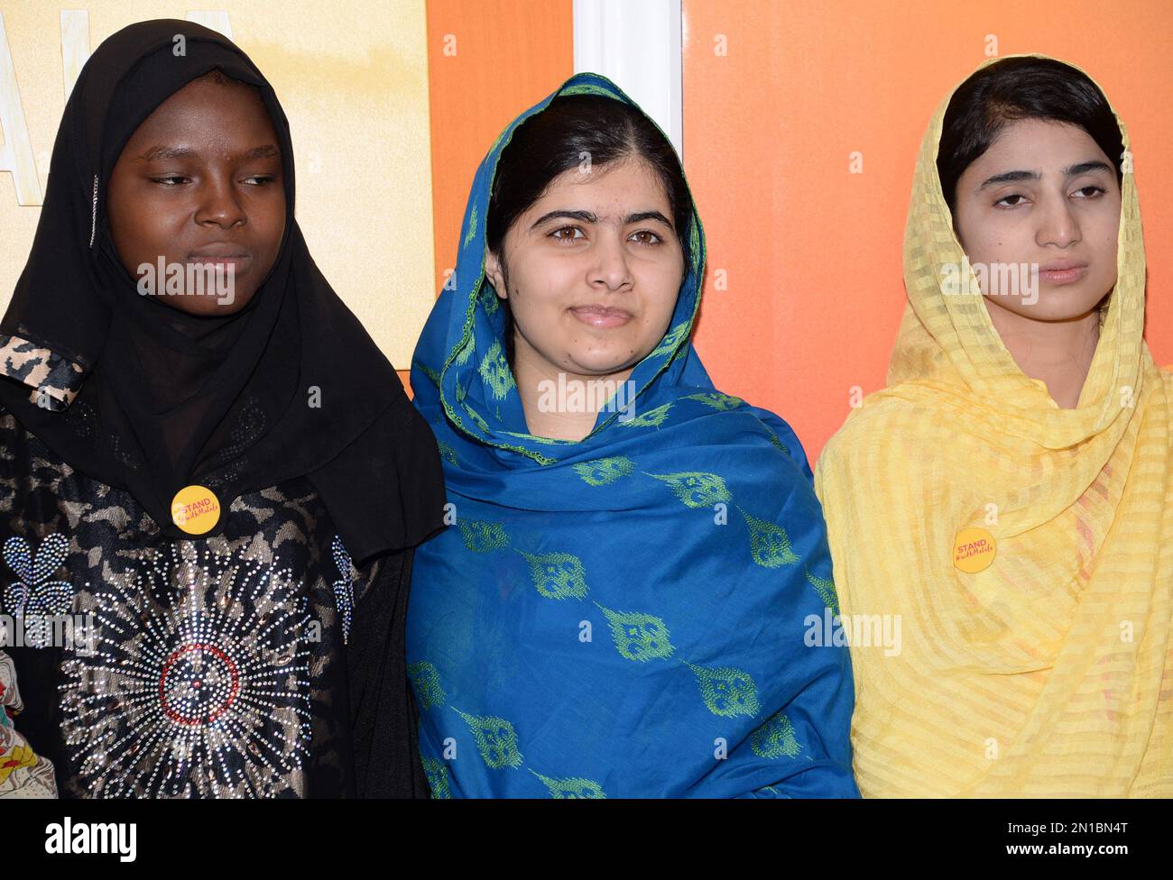 Malala Yousafzai, center, with friends Amina Yusuf, left, and Kainat Soomro at the premiere of ...