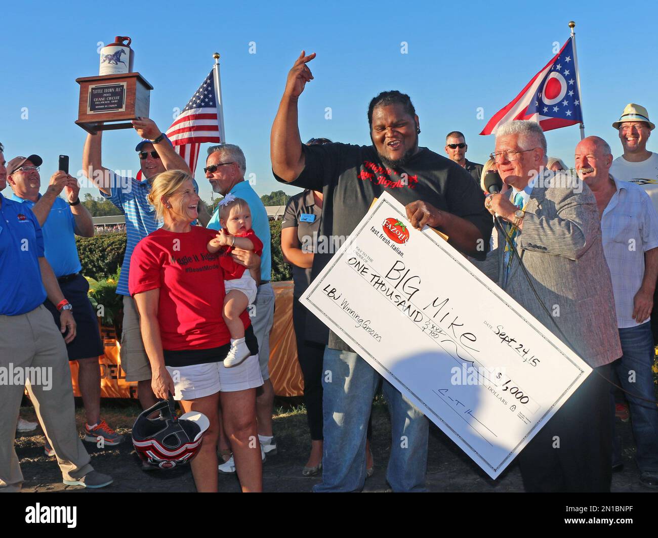 Caretaker “Big” Mike Taylor raises his hand after announcer Roger ...